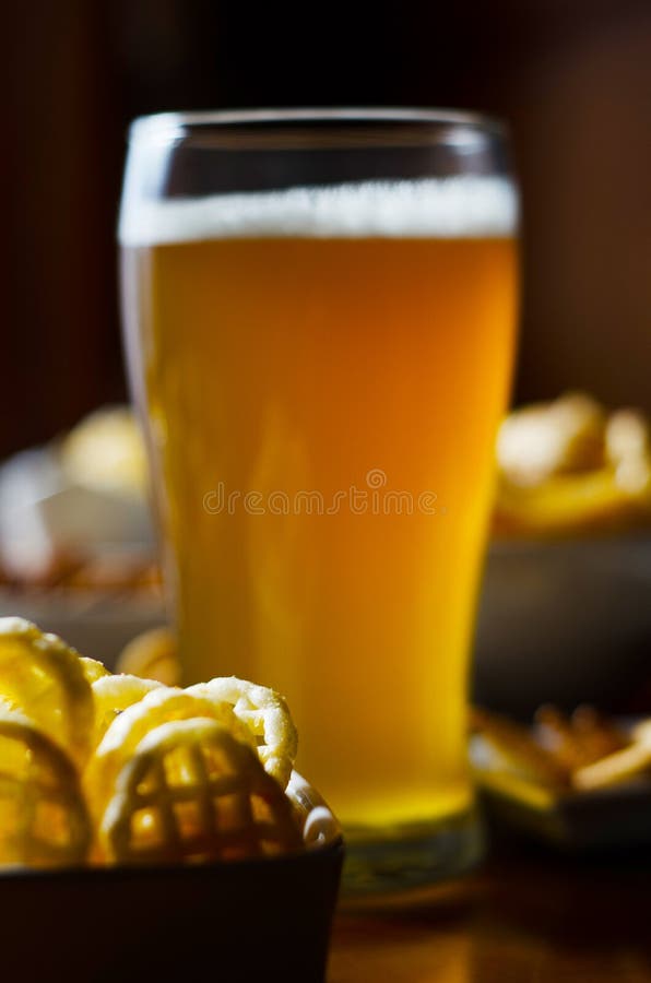 Pint of Lager Beer in a Glass, Set of Various Snacks, a Standard Stock ...