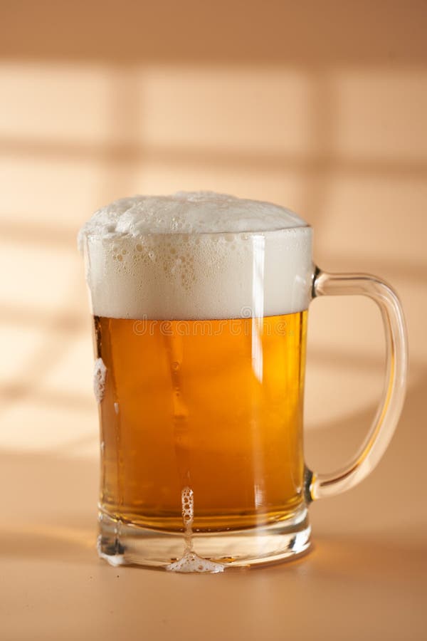 A pint of lager stock image. Image of brown, light, draught - 300630199