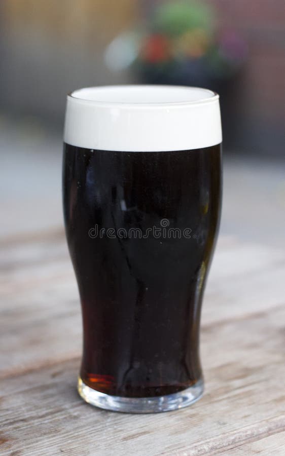 Pint of Stout stock image. Image of guiness, froth, beer - 97513569