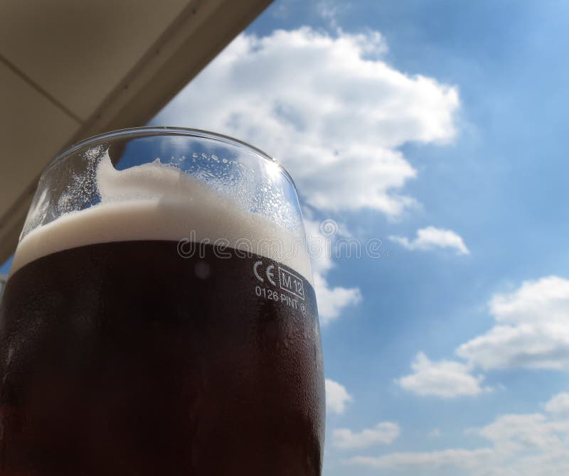 Pint UK beer glass. stock photo. Image of bitter, glass - 26836814