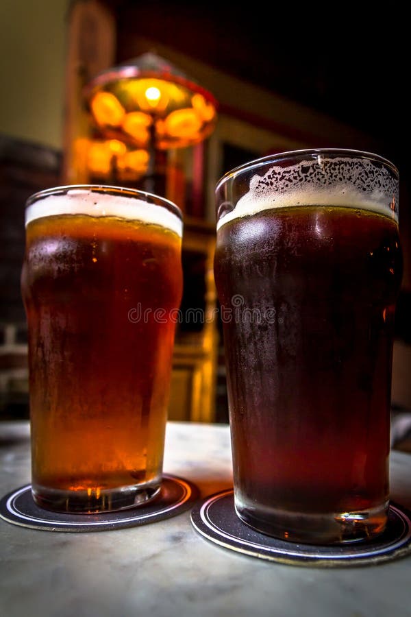 Pints of beer stock photo. Image of time, brewed, brew - 59985406