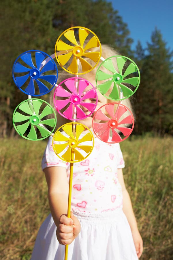 Pinwheel in hand stock photo. Image of lifestyle, restful - 15262878