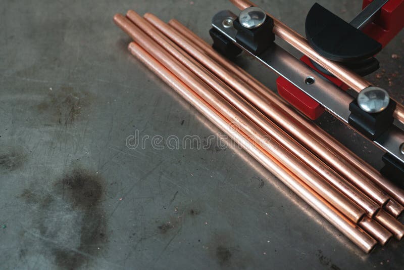 Stack of brass pipes. stock photo. Image of bender, fitting - 138425042