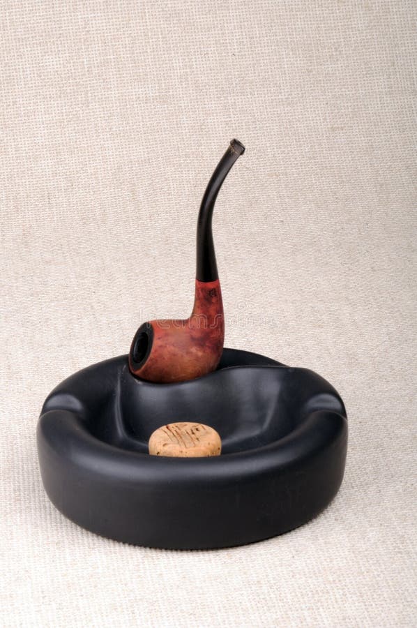 Pipe and ceramic ashtray stock photo. Image of tobacco - 72478308