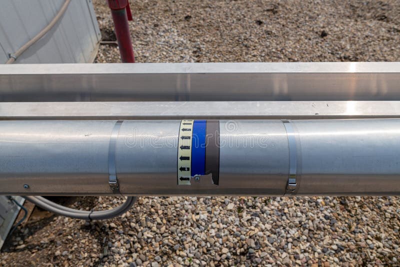 Pipe with Directional Pointers Stock Photo - Image of label, direction ...