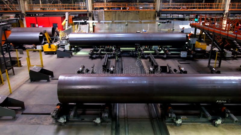 Pipe Factory Production Line, Pipes Moving on Roller Conveyor Stock ...