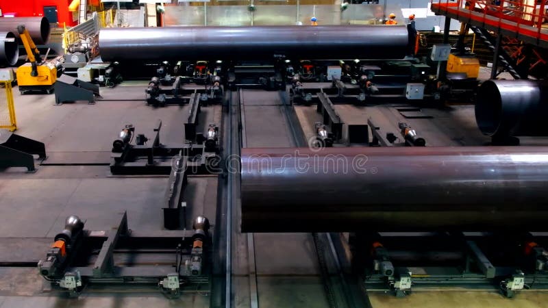 Pipe Factory Production Line, Pipes Moving on Roller Conveyor Stock ...
