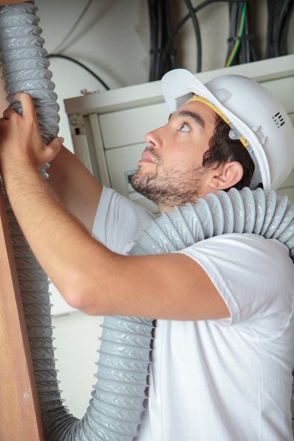 Pipe Fitter Installing Pipe Stock Image - Image of replace, pressure ...
