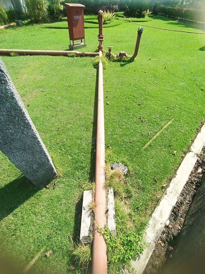 Pipe on a gress stock photo. Image of pipe, elbow, gress - 285001976