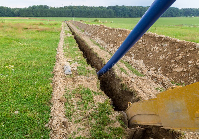 Pipe Laying Construction Site on a Meadow Stock Photo - Image of water ...