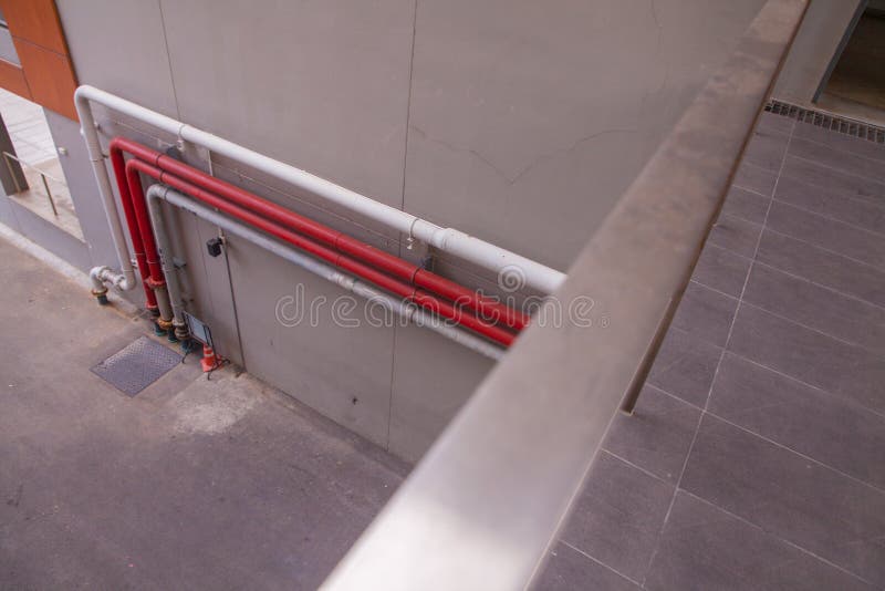 Pipe line on the wall stock image. Image of design, piping - 105594465