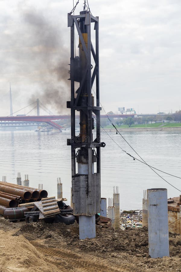 Pipe Piles Being Driven into the Ground Stock Image - Image of ...