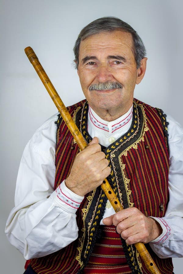 Pipe Player in Traditional Clothing Stock Photo - Image of color ...