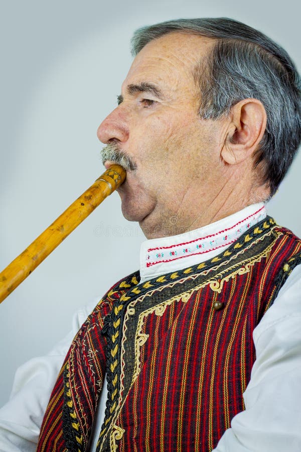 Pipe Player in Traditional Clothing Stock Image - Image of folklore ...