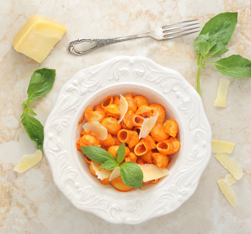Pipe Rigate Pasta with Cheese, Basil and Pine Nuts Stock Photo - Image ...