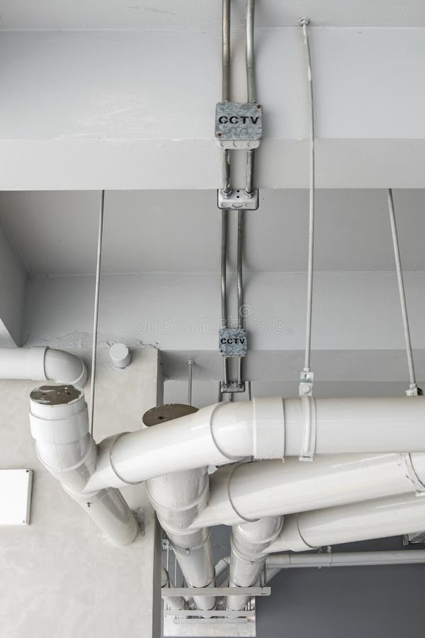 Pipe system in building stock image. Image of piping - 99760821