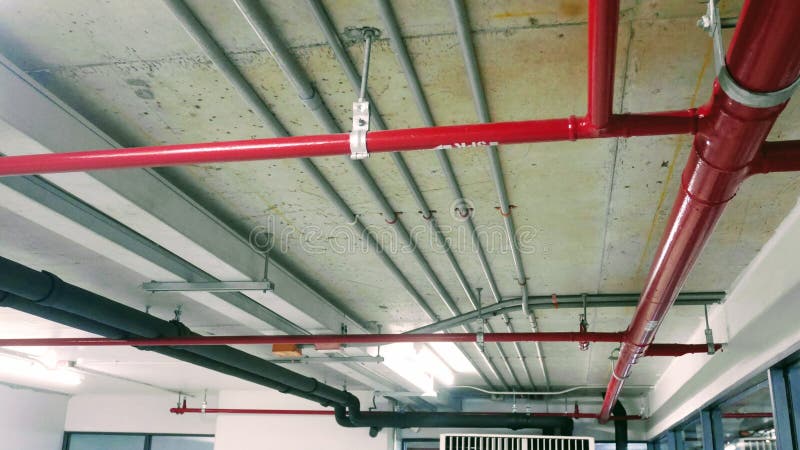 Red fire protection pipe stock photo. Image of pipe - 124113230