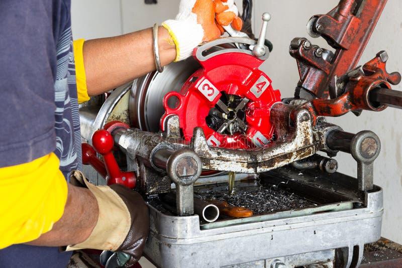 Pipe threading machine stock photo. Image of plumbing - 87711368