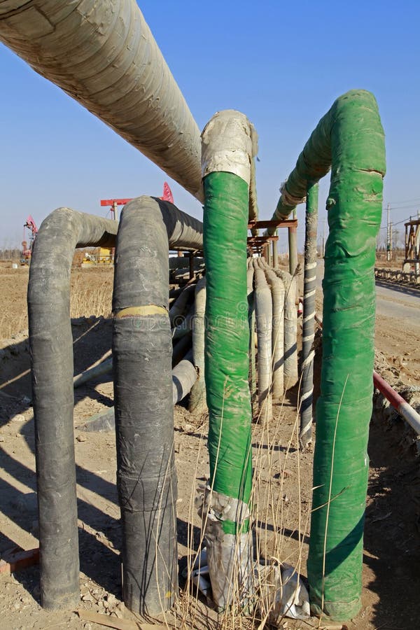 The Pipe and Valve Oil Fields Stock Photo - Image of fields, commercial ...
