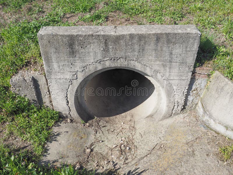 Piped ditch entrance stock image. Image of meadow, ditch - 90590467