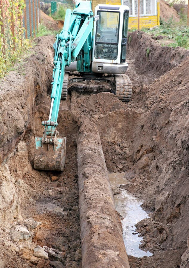 Construction Worker Digging a Deep Underground Hole with a Shove Stock ...