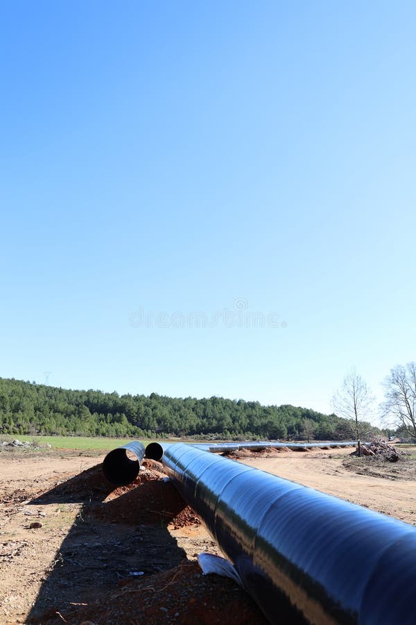 Pipeline construction site stock photo. Image of pipes - 357044654