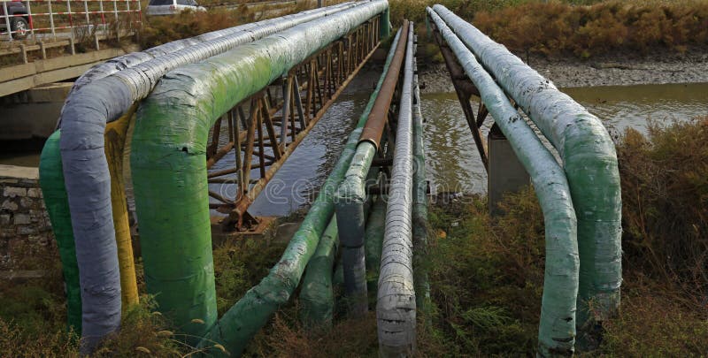 Pipeline of oil fields stock photo. Image of faucets - 310486892