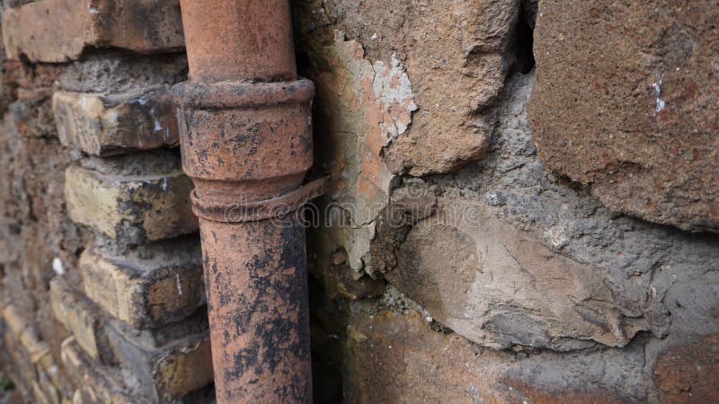Pipeline pipe on brick stock image. Image of europe - 112068923