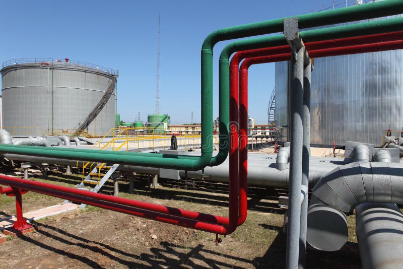 Pipeline,storage Tanks And Buildings Of A Refinery - Industrial Plant ...