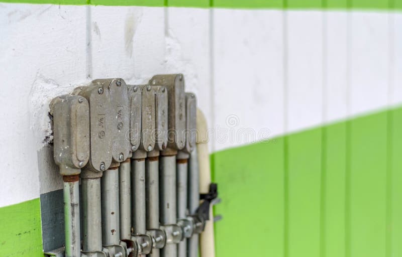 Pipeline on the wall stock photo. Image of pipe, small - 44607170