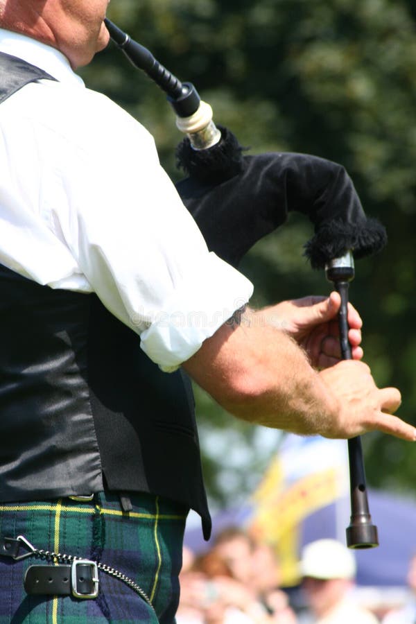 Piper stock photo. Image of march, pipe, loud, hands, green - 976606