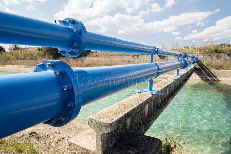 Pipes Above the Water Channel Stock Photo - Image of water, tube: 80431728