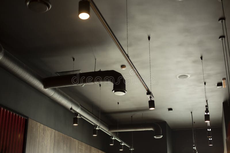 Pipes on Ceiling. Ventilation in Building. Details of Room. Black ...
