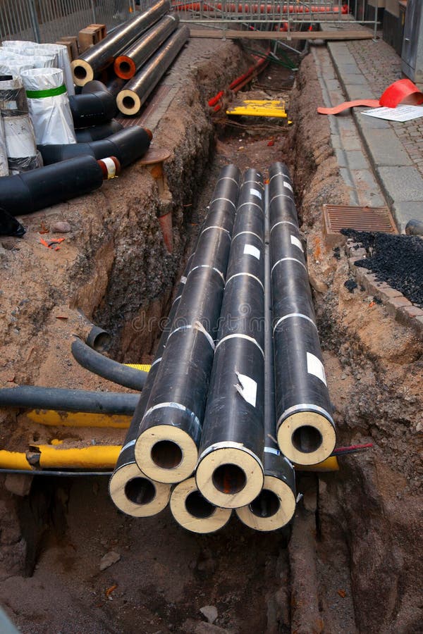 Pipes in dug up street stock image. Image of black, pipes - 21410311