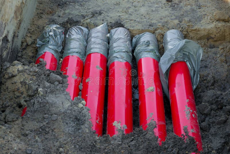 Pipes in ground stock photo. Image of supply, insulated - 34082356