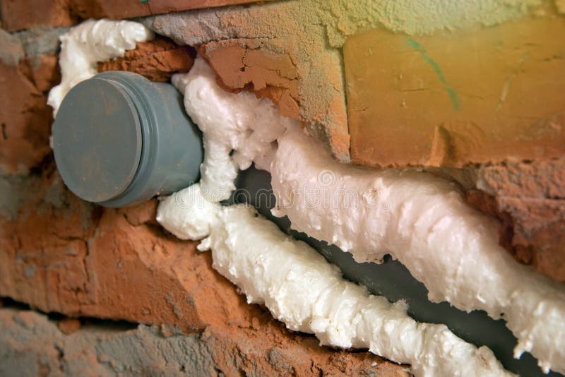 Pipes in Isolation are Fixed by Mounting Foam Stock Image - Image of ...