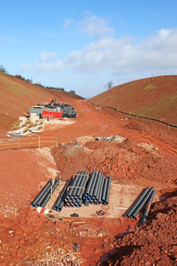 Pipes on a Road Construction Site Stock Image - Image of black, pipe ...