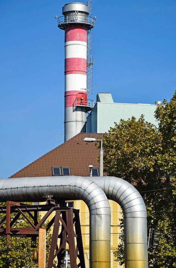 Pipes and Smoke Stack of an Old Factory Building Stock Photo - Image of ...