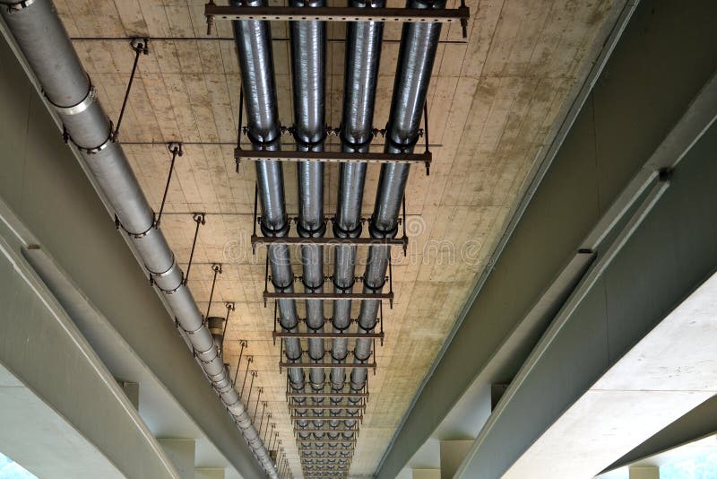 Under Bridge Pipes stock photo. Image of pipeline, sewer - 57586226