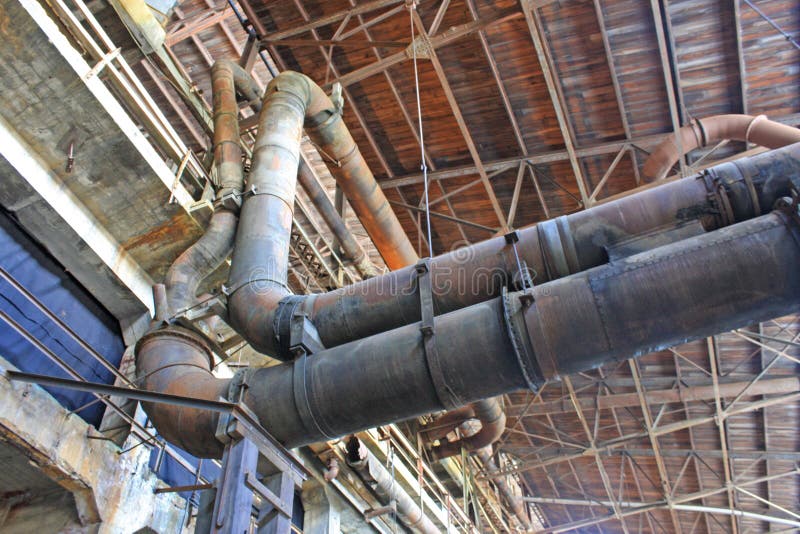 Pipes in a warehouse stock image. Image of industry - 130320453