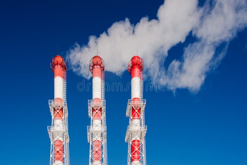 Steam Comes Out a Chimney Above a Factory with White Steam Cloud on ...
