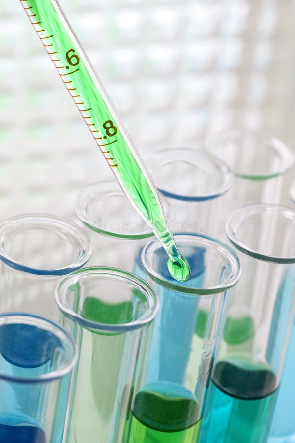 Microbiology - Pipette With Drop Liquid And Petri Dishes Stock Image ...