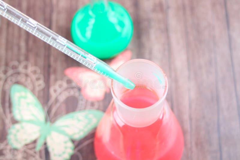 Pipette and Colored Bulbs on a Table Stock Image - Image of biochemist ...