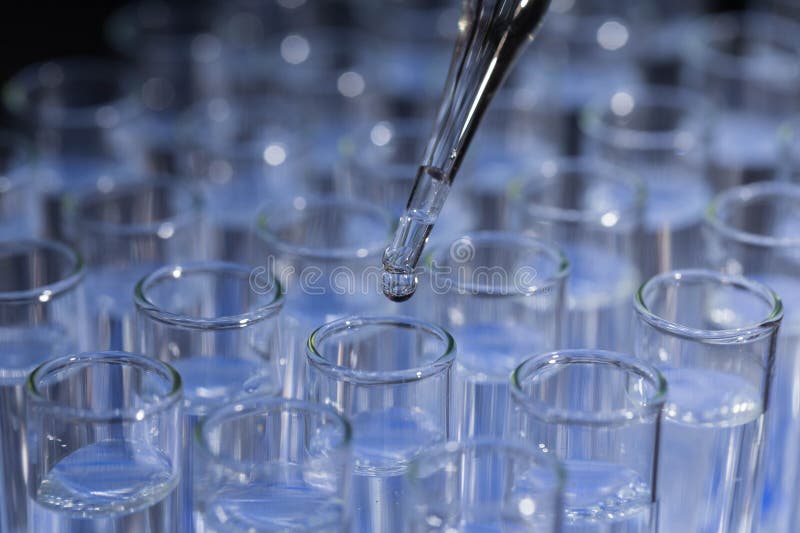 Pipette Dropping Fluid into Test Tube Stock Image - Image of testtube ...