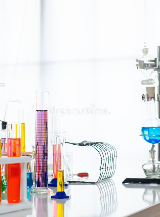 A Pipette Dropping Sample into a Test Tube,abstract Science Background ...