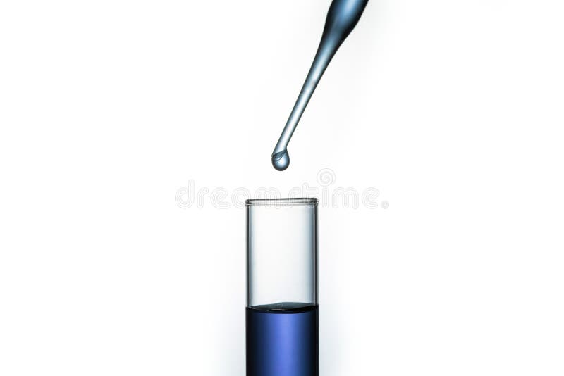 Pipette Tip Dropping Dark Blue Liquid into a Test Tube Isolated on a ...