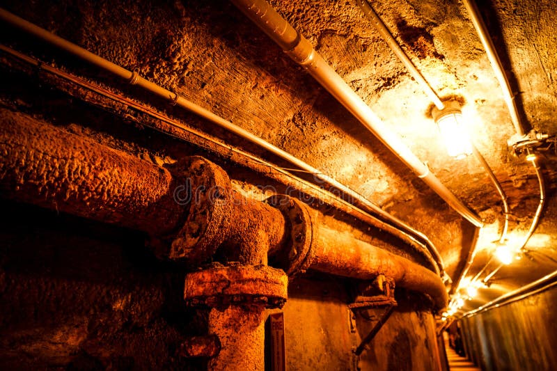 Piping Illuminated by Red Light Stock Photo - Image of underpass ...
