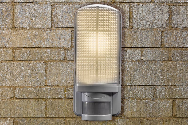 PIR Security Light on a Stone Wall Stock Image - Image of panel ...