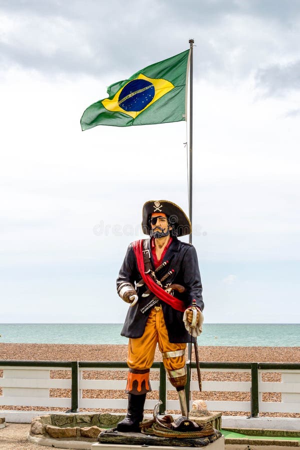 Pirate statue on the beach stock photo. Image of coat - 59100764