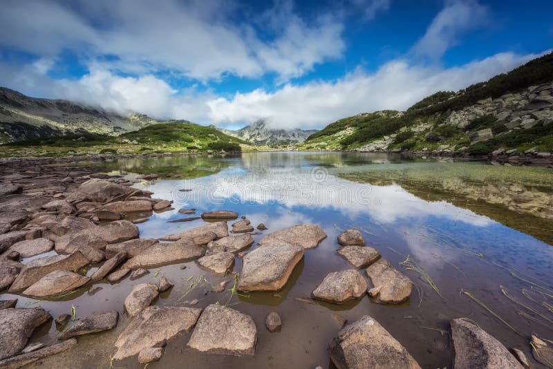 Pirin mountains in summer stock image. Image of clouds - 108457153